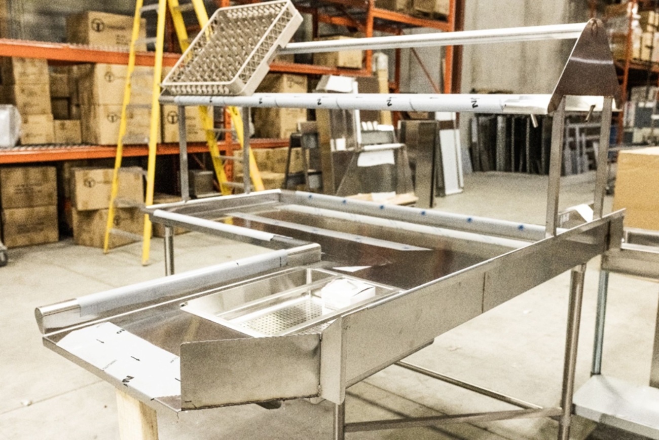 The Role of Dish Tables in Commercial Kitchen Layout